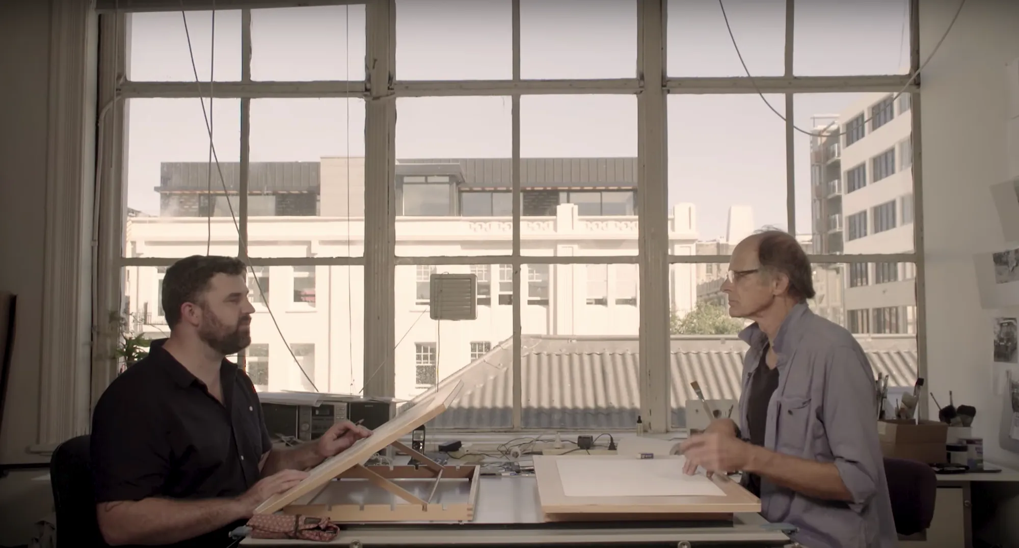 Spinoff cartoonist Toby Morris chats with Bob Kerr in his Wellington ...